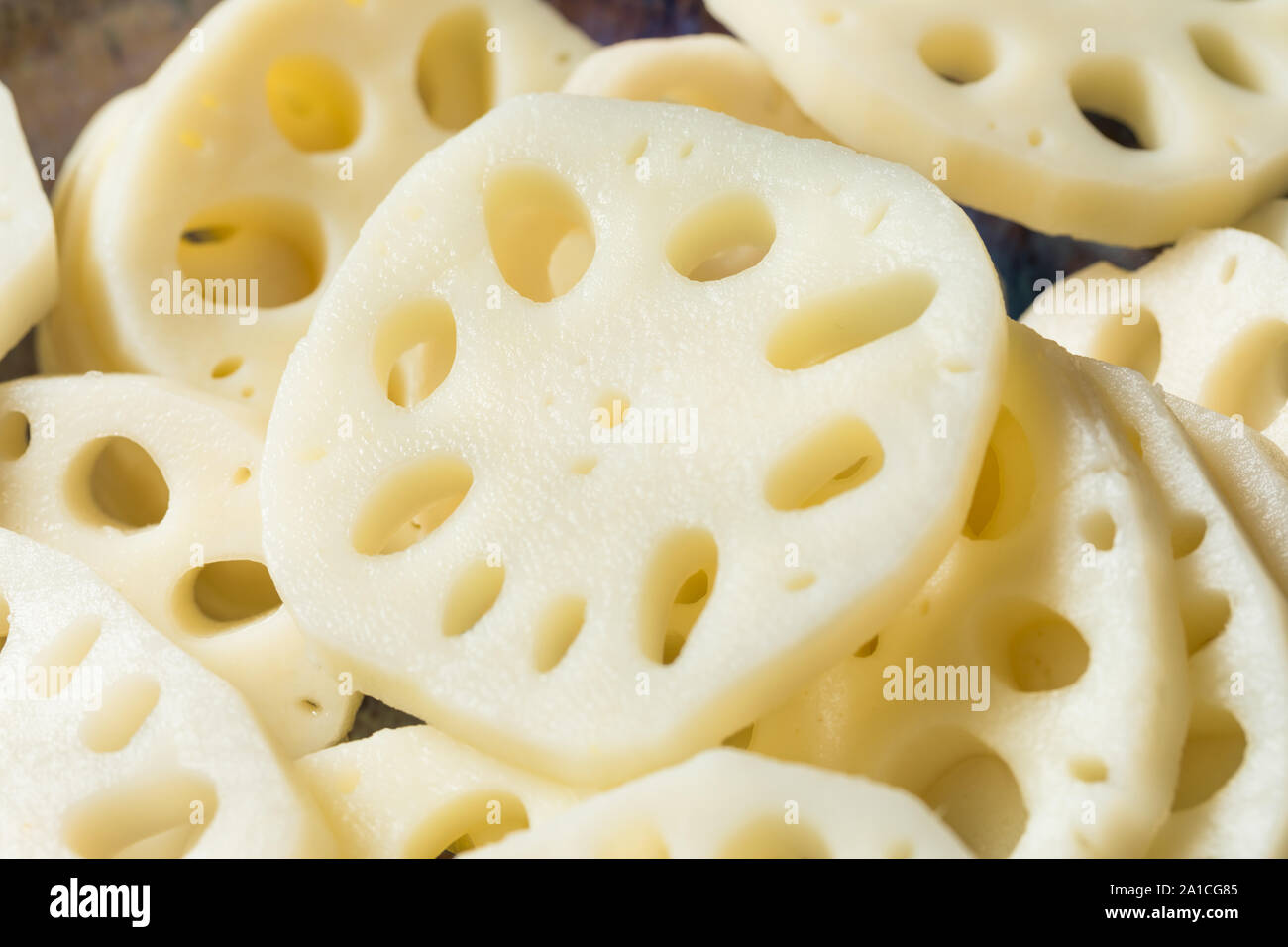 Raw Organic White Lotus Root in Slices Stock Photo - Alamy