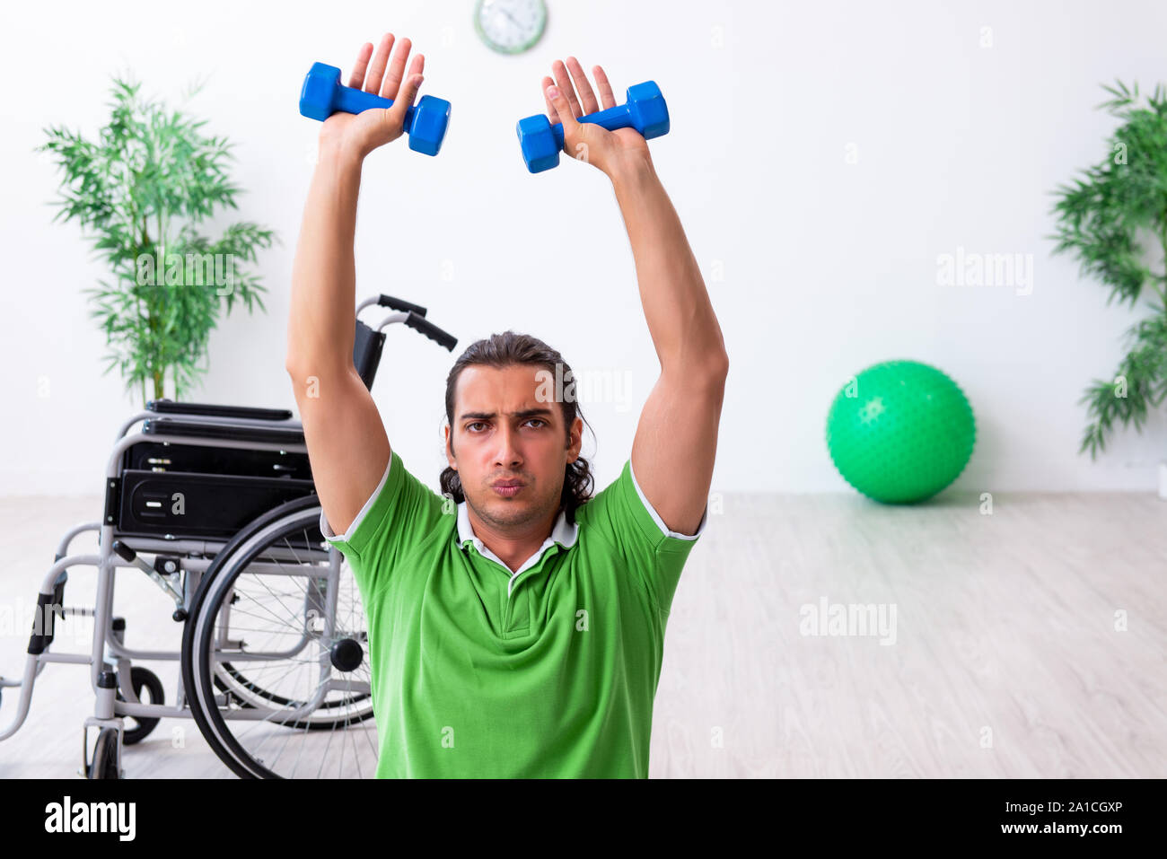 Wheelchair man lifting weight in hi-res stock photography and images ...