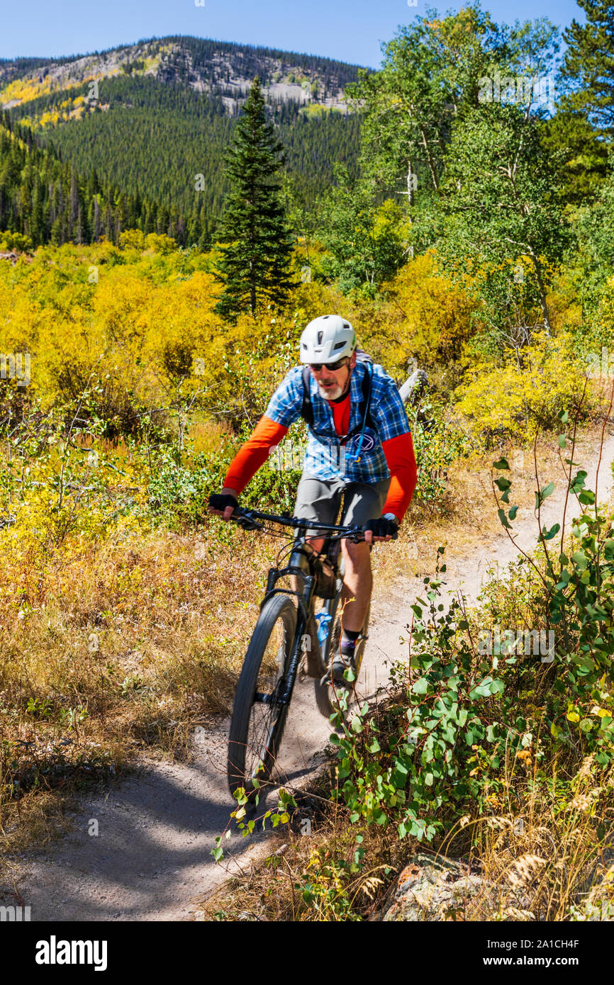 Mountain bikers descend Silver Creek Trail from the Monarch Crest Trail ...