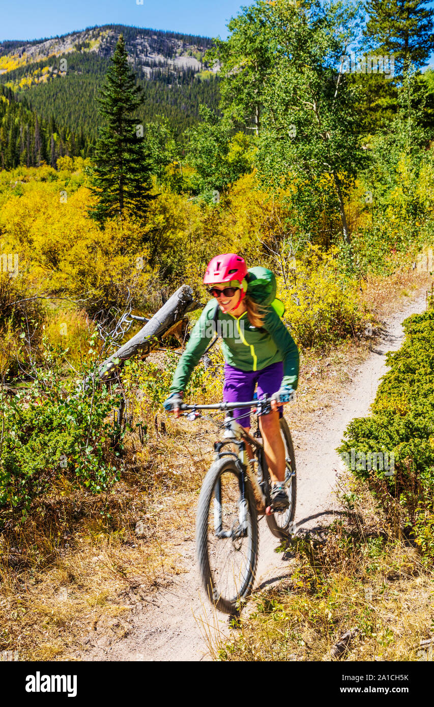 Mountain bikers descend Silver Creek Trail from the Monarch Crest Trail ...