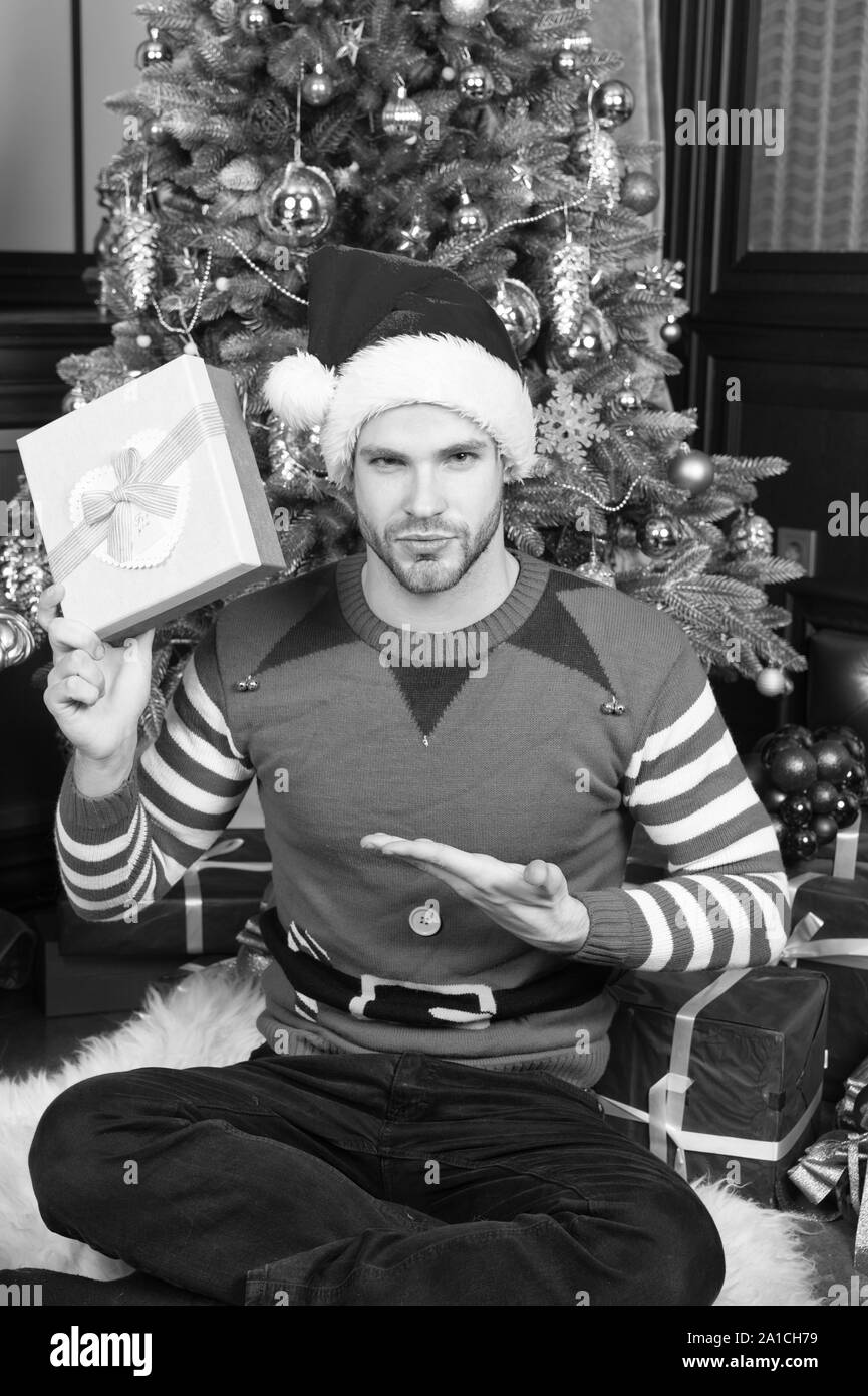 Christmas preparation man celebrating Black and White Stock Photos ...