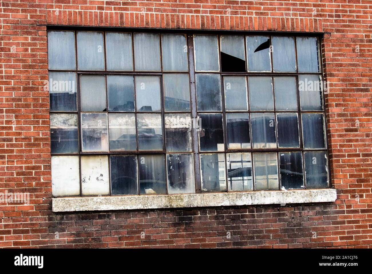 Old warehouse broken window Stock Photo - Alamy