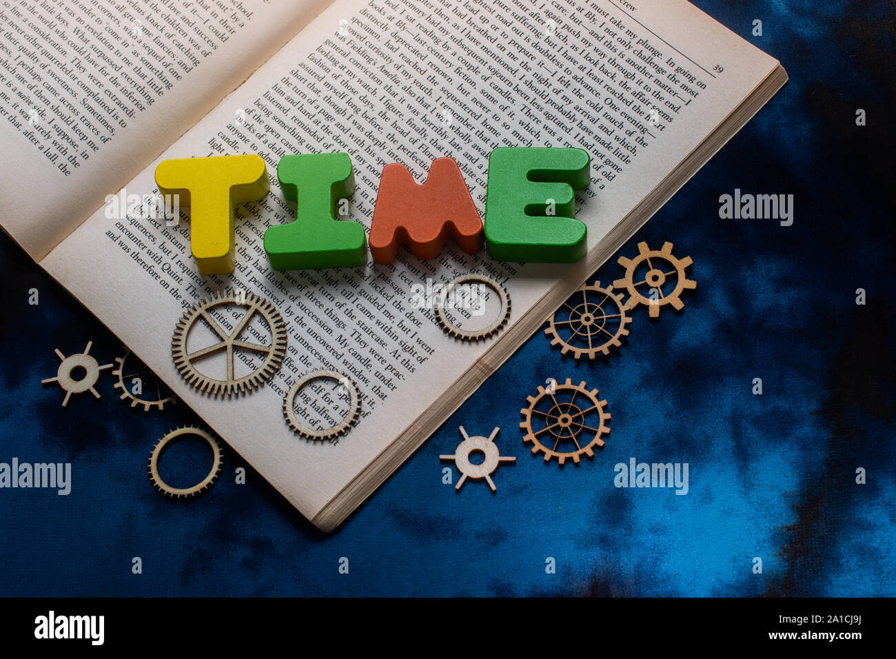 Colorful time wording with gears as time concept Stock Photo - Alamy