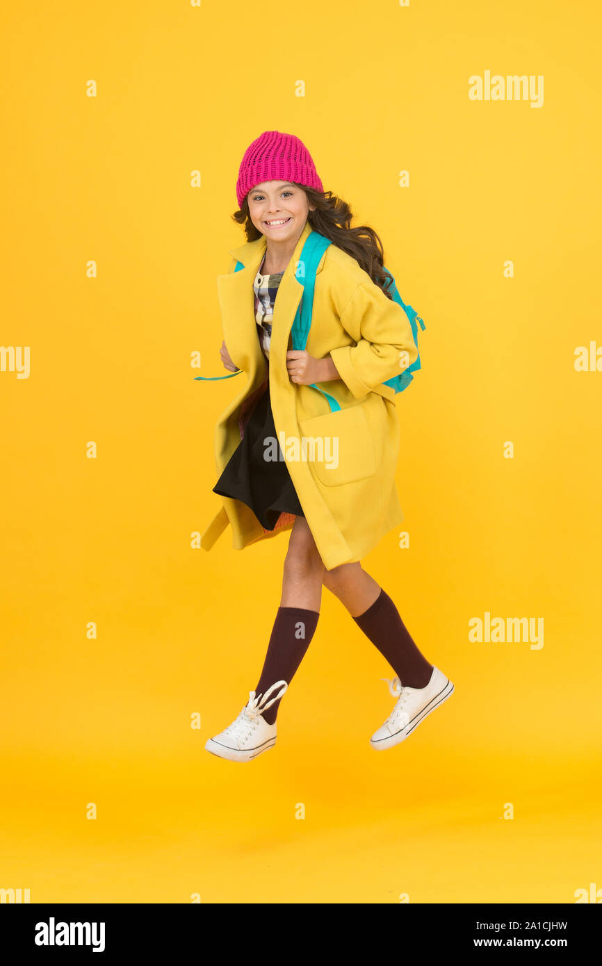 Cool schoolgirl. Have fun charismatic girl on yellow background. Madcap ...