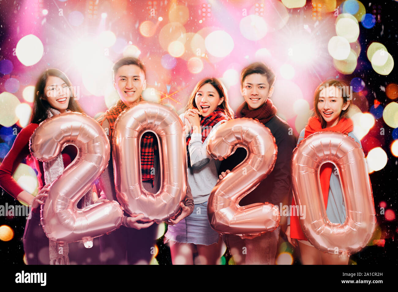 happy young group celebrating new year 2020 party Stock Photo - Alamy