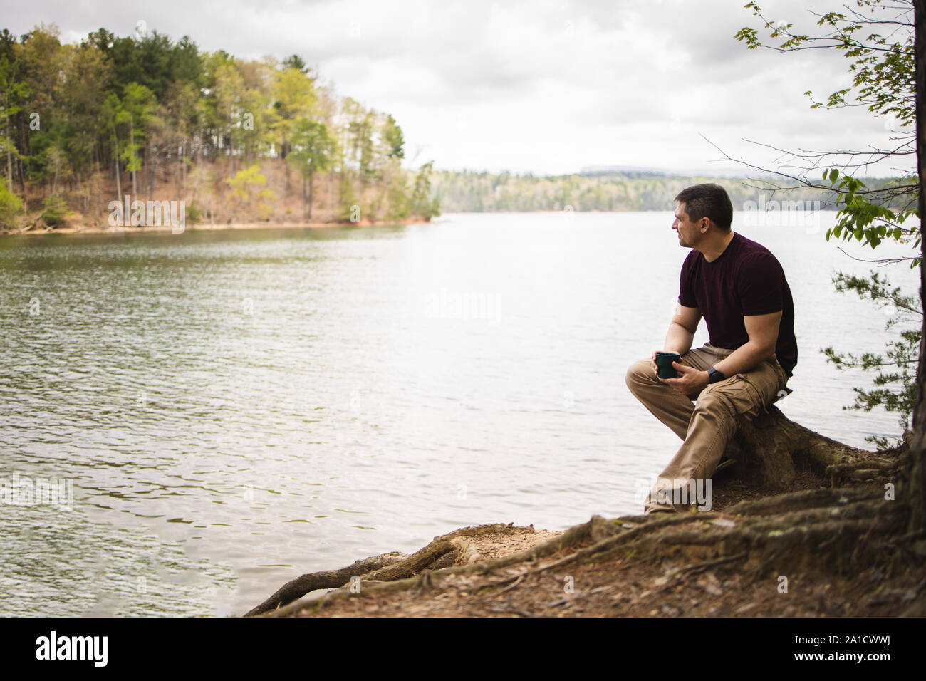 Back view man sitting river hi-res stock photography and images - Alamy