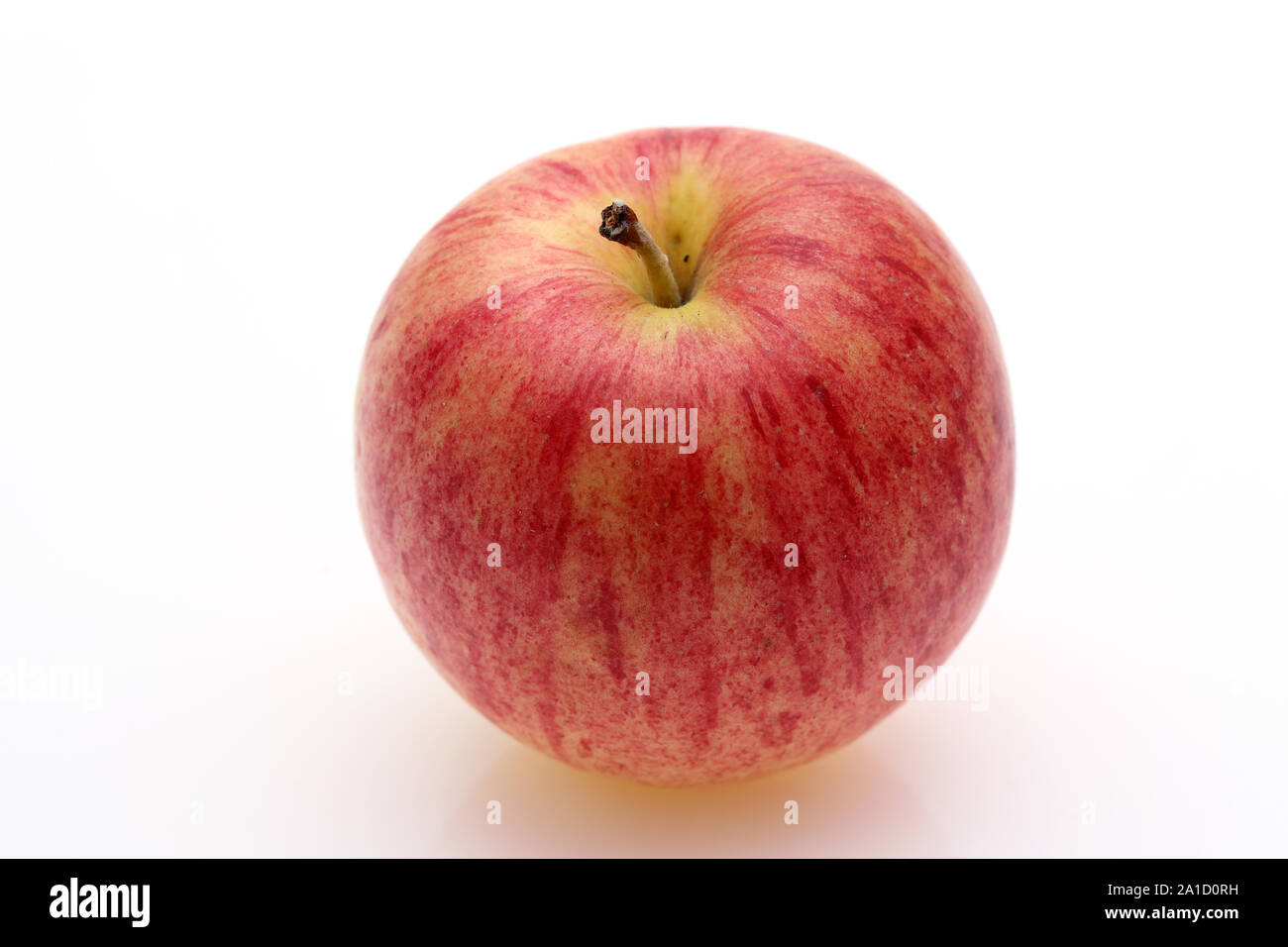 Single red apple on a white background Stock Photo - Alamy