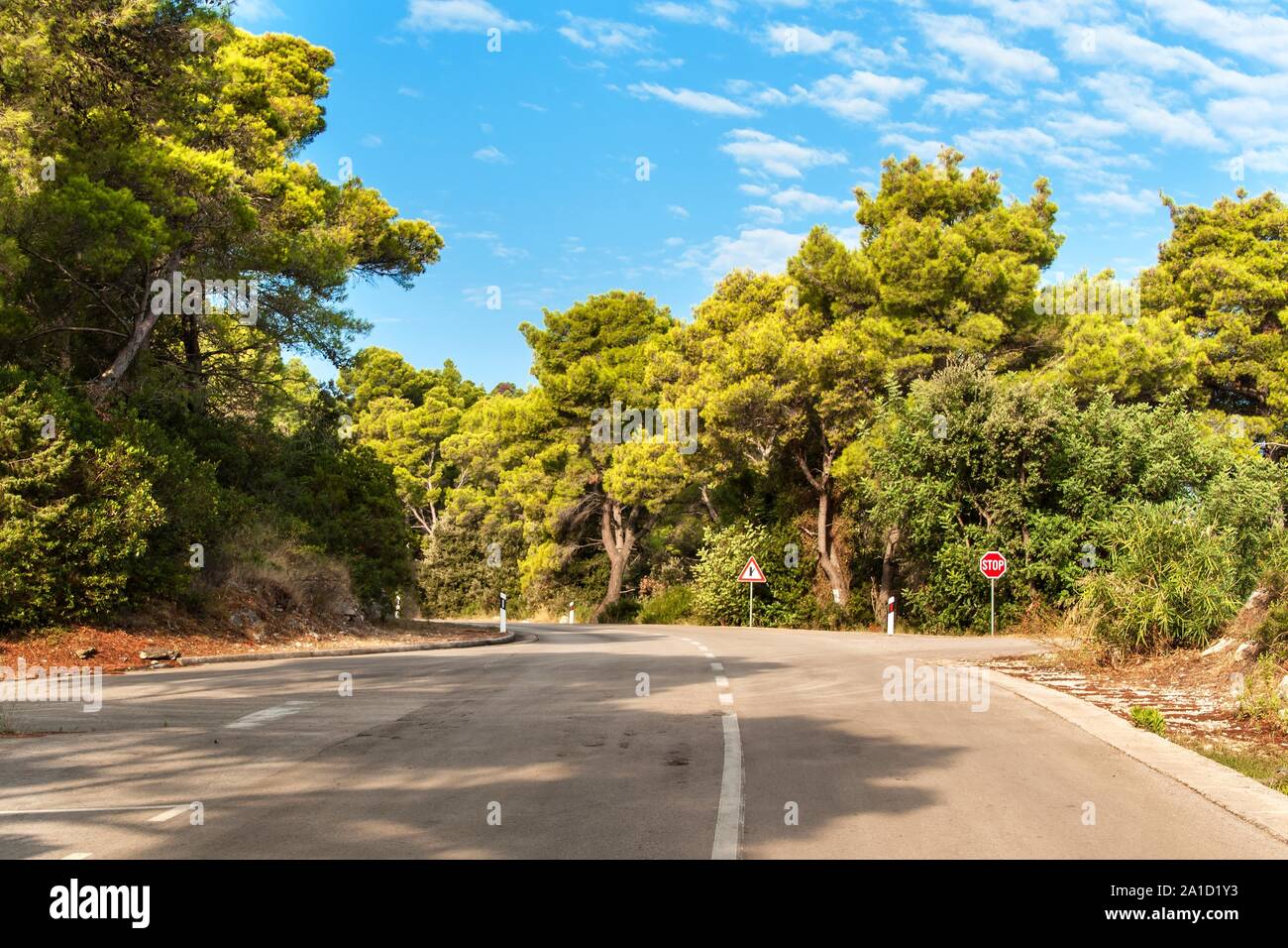 Stop sign country road intersection hi-res stock photography and images ...