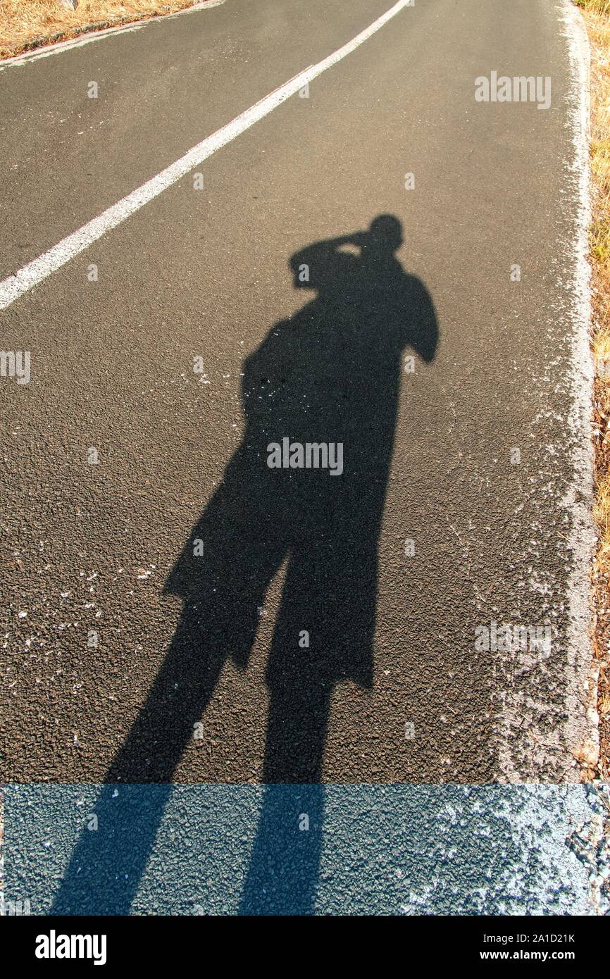 Long human sun shadow on hi-res stock photography and images - Alamy