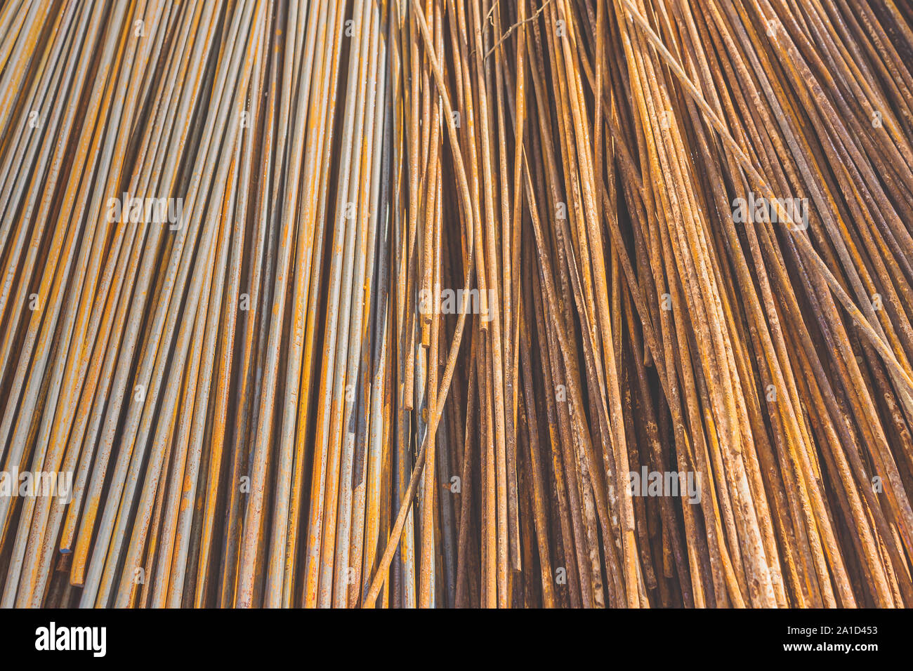 Background texture of old rusty steel bars construction materials in a ...