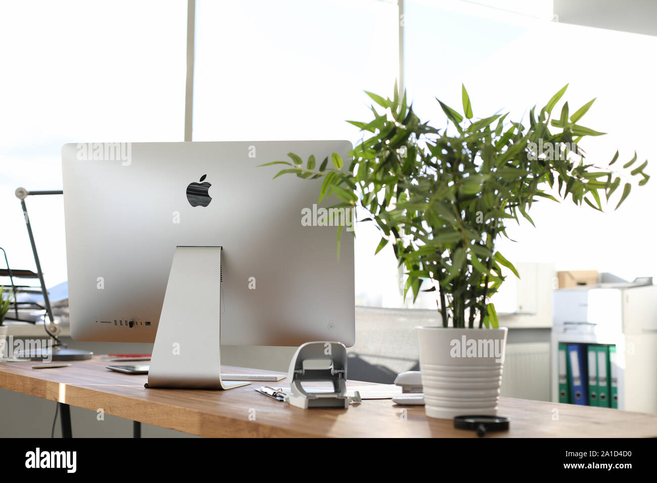 Modern pc apple imac in office table Stock Photo - Alamy