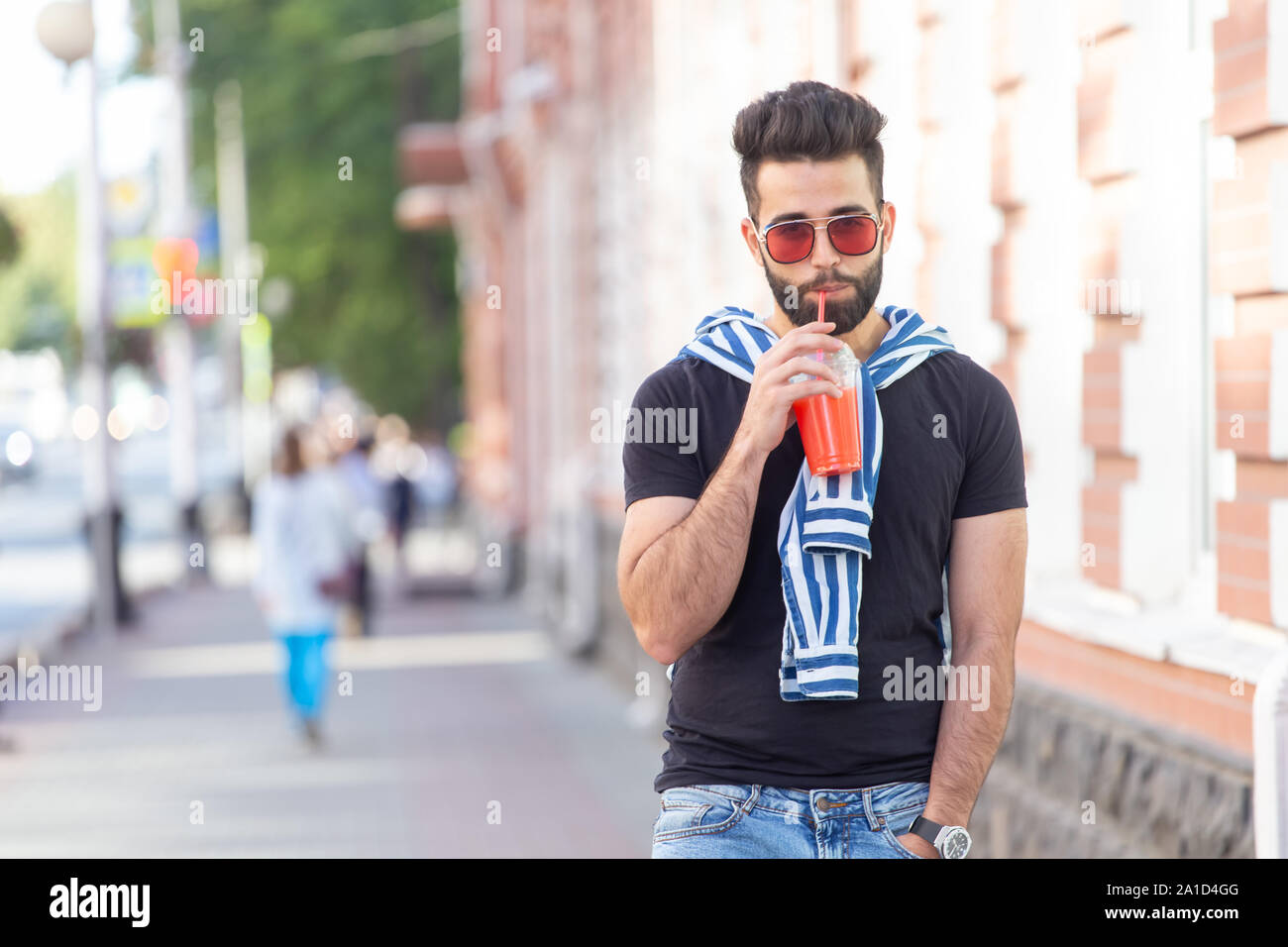 Cute stylish arab young male hipster with a mustache and a beard and ...