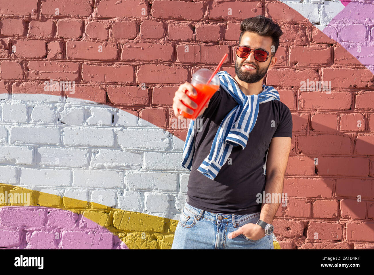 Cute stylish arab young male hipster with a mustache and a beard and ...