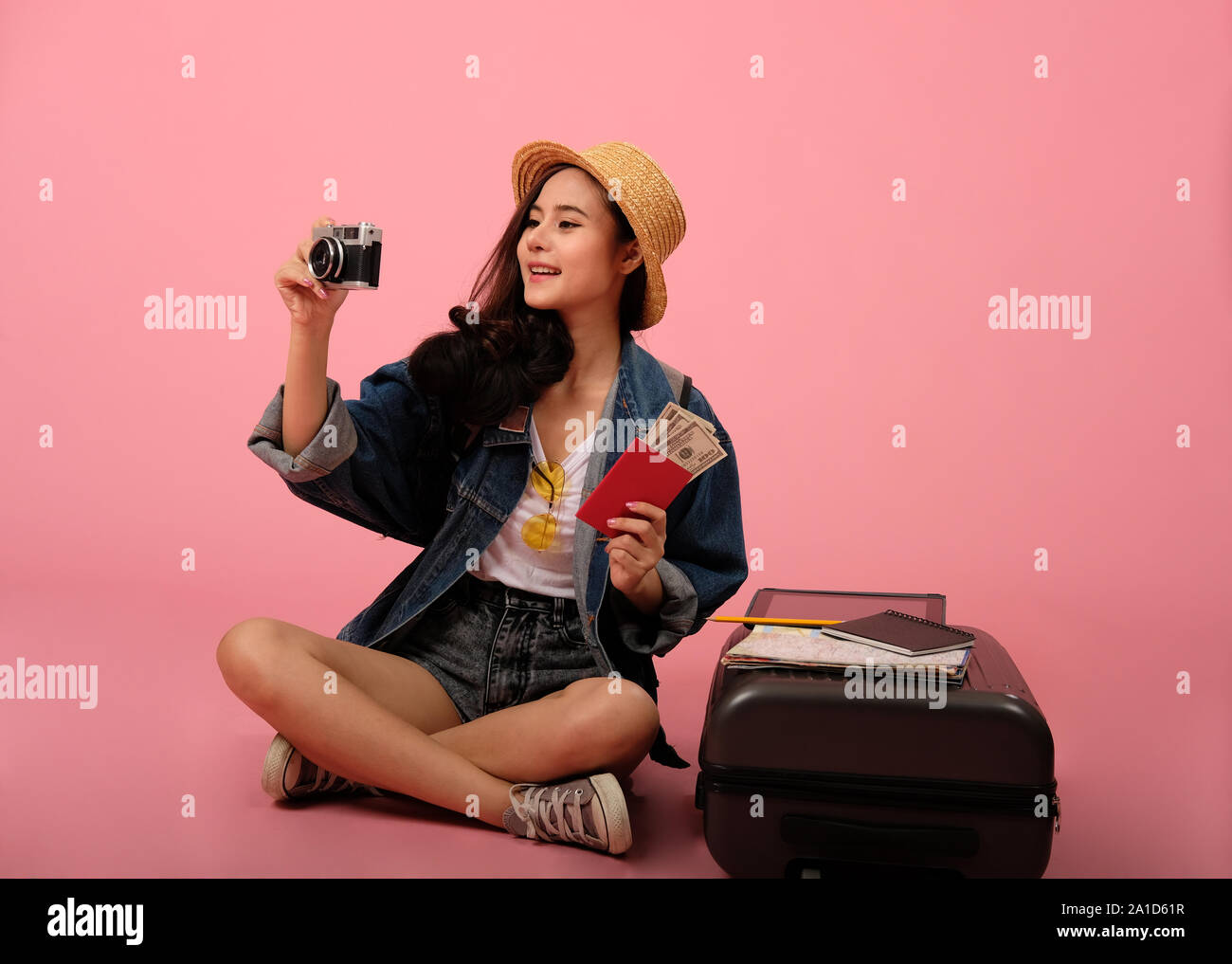 young asian woman backpacker traveler with camera passport. journey ...