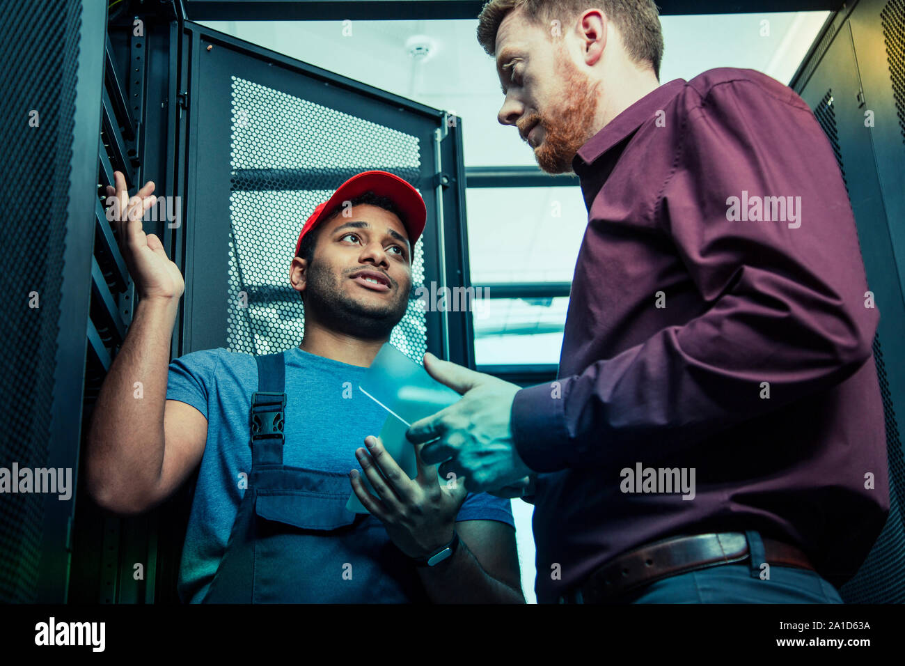 Nice smart man trying to explain the problem Stock Photo - Alamy