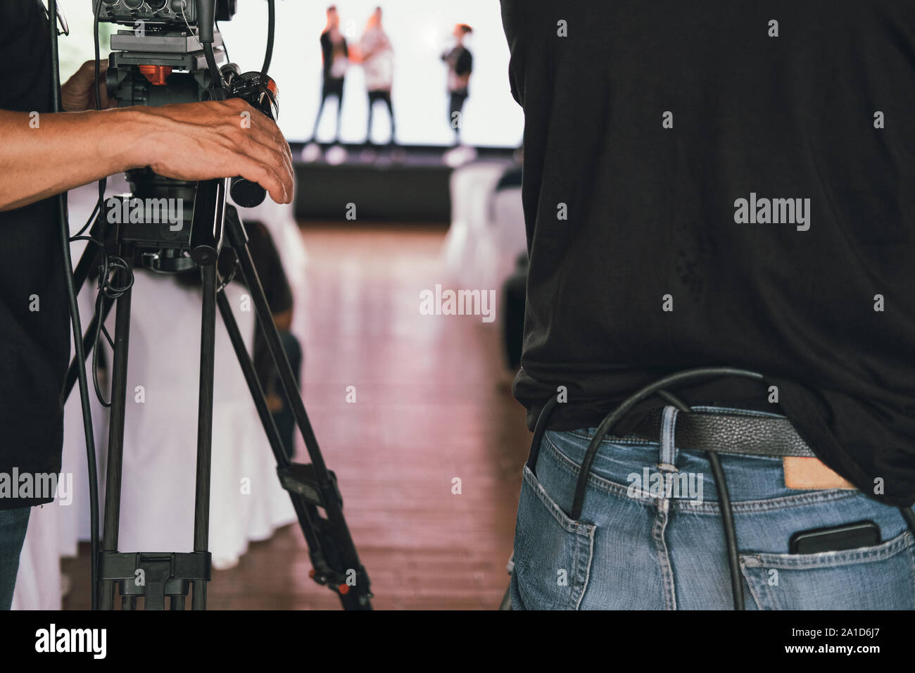 professional video production camera recording live event on stage ...
