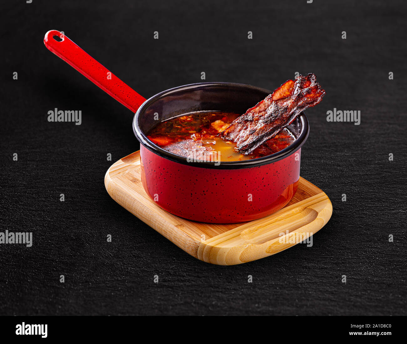 Pink peppered bean soup with tarragon, smoked pork knockle and bacon ...