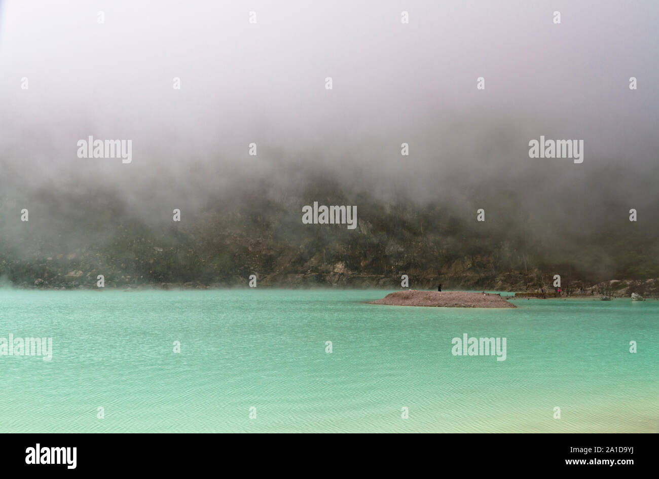 Fog forming on volcanic crater lake surface in Bandung, West Jawa Stock ...
