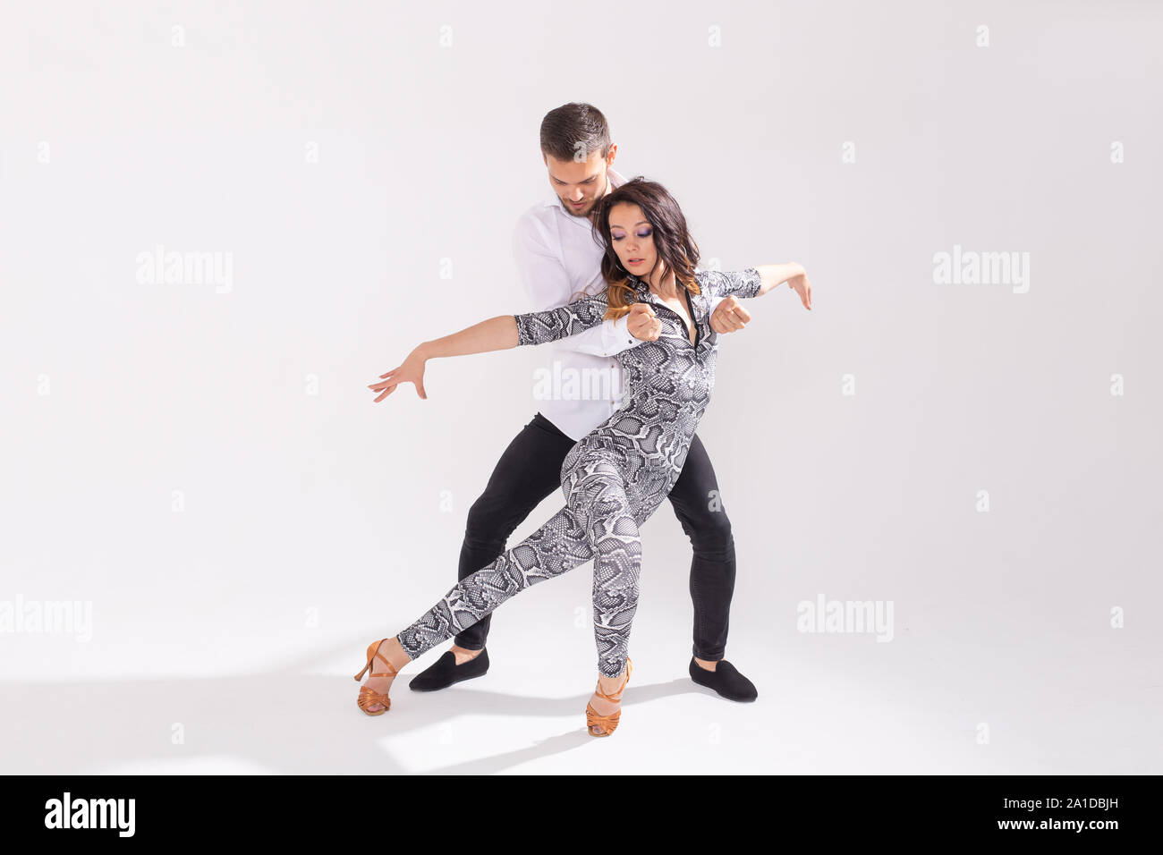 Passionate couple dancing social danse kizomba or bachata or semba or ...