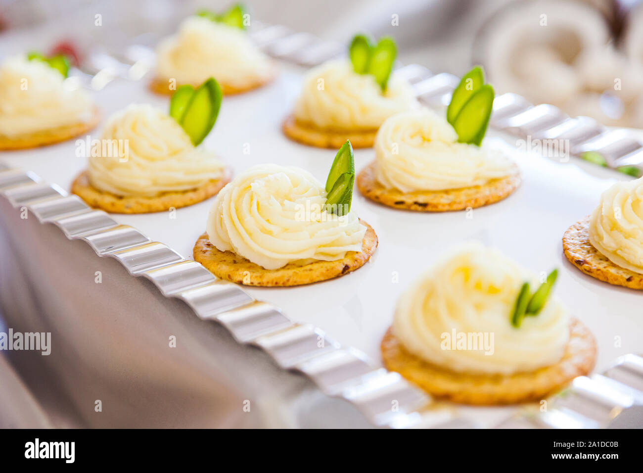 Cream Cheese with Cucumber on Cracker Stock Photo - Alamy