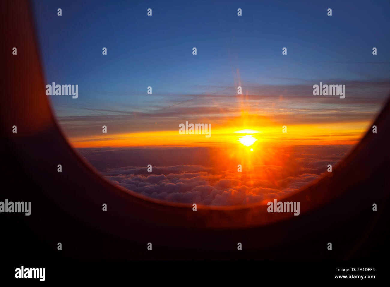 sunset view from airplane window Stock Photo - Alamy