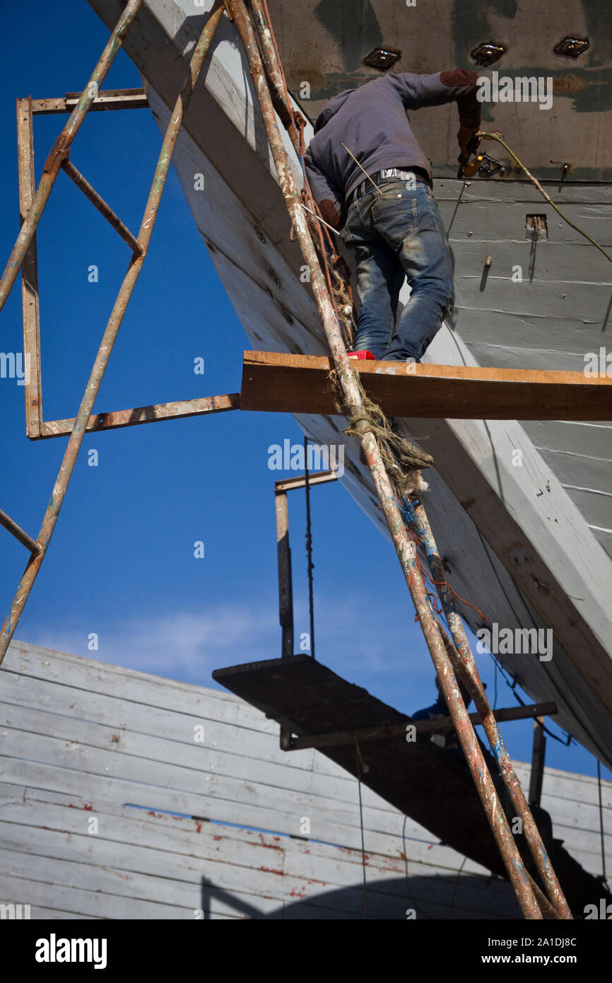 Repairing a boat in the dry dock in Essaouira, Morocco, Africa Stock ...