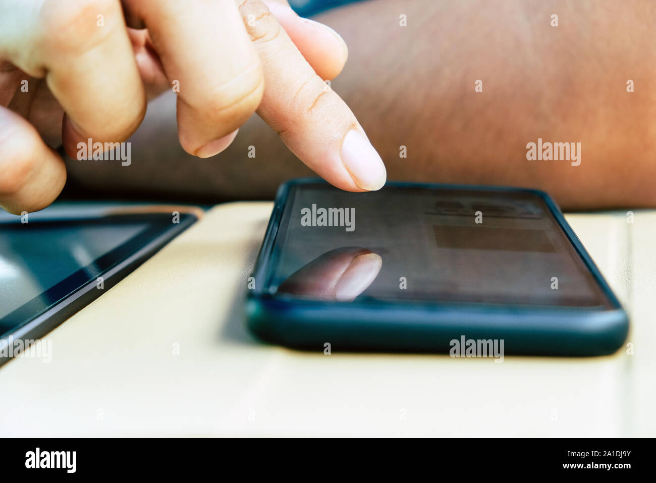 image of people using a smartphone Stock Photo - Alamy