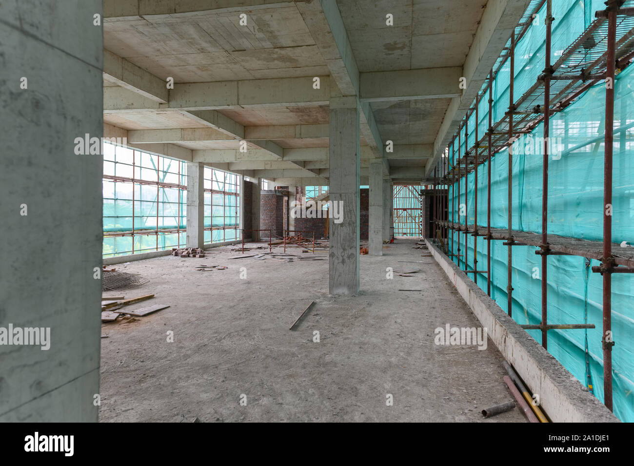 inside of an unfinished building with protection scaffolding and ...