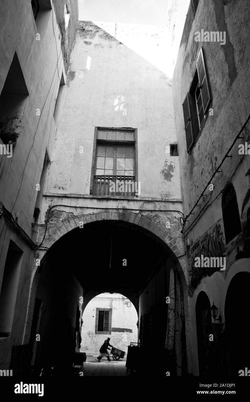 Pushing a barrow inside the medina in Essaouira, Morocco, Africa Stock ...