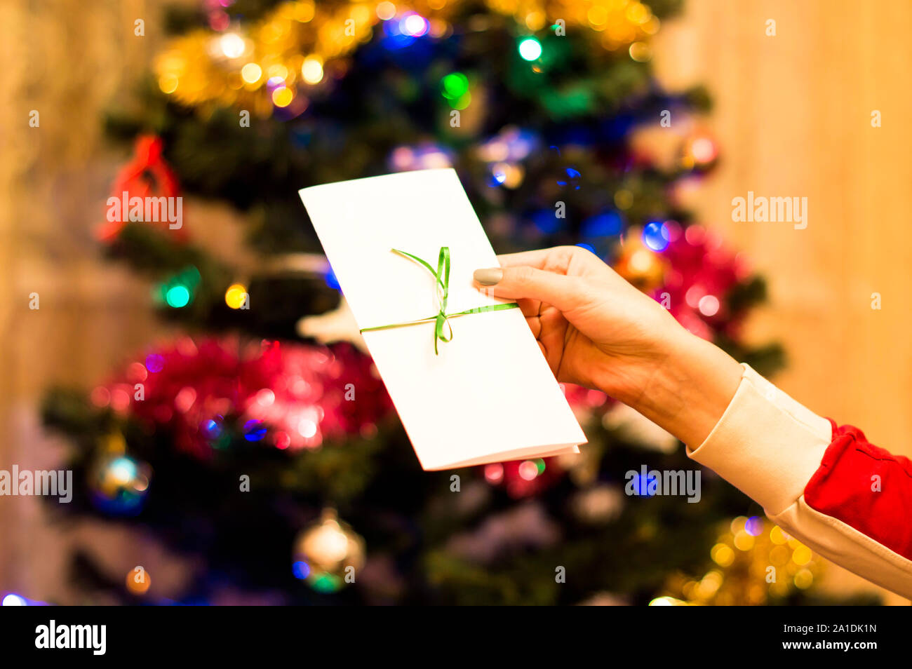 Envelope with a bow hi-res stock photography and images - Alamy