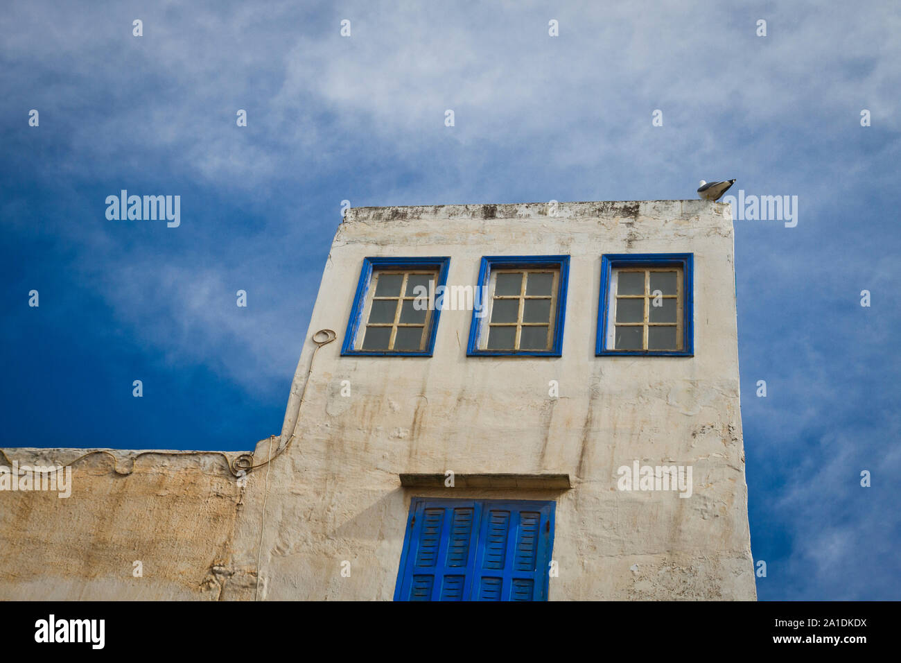 A three-windowed house in Essaouira, Morocco, Africa Stock Photo - Alamy