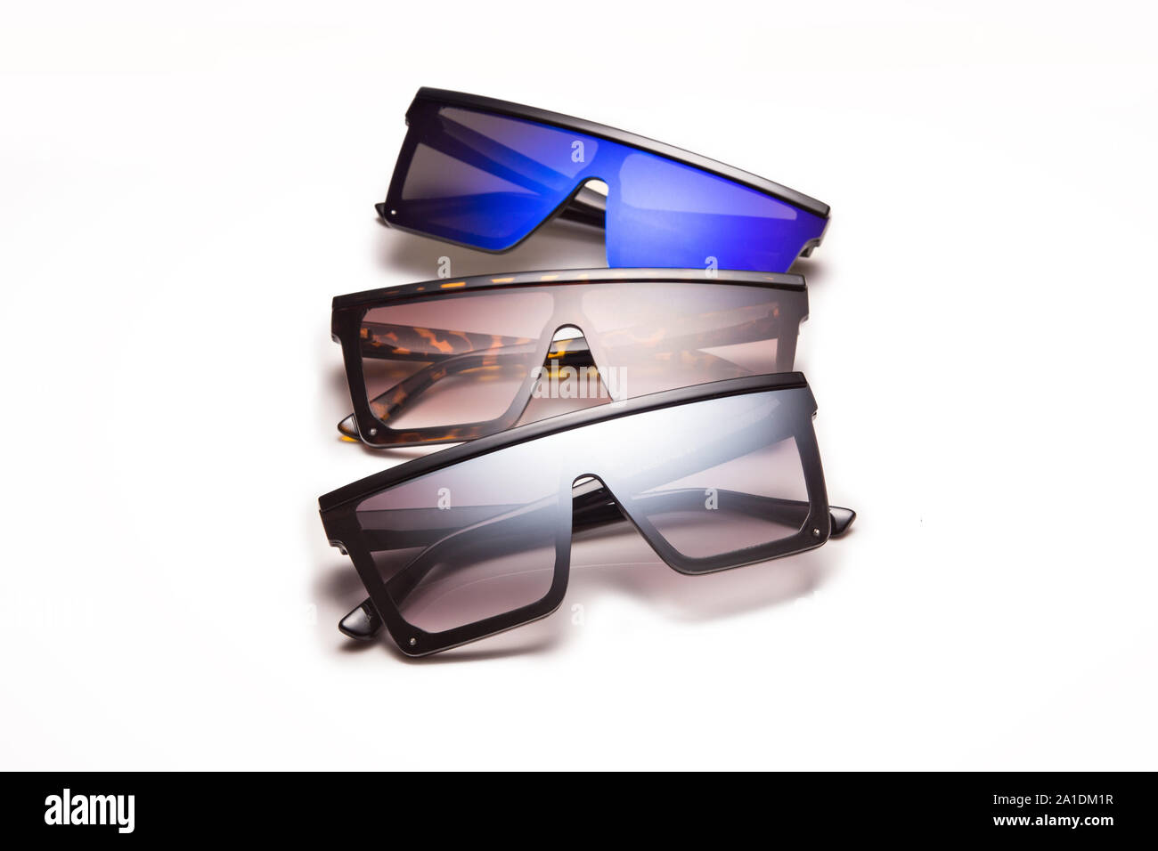 three modern glasses seen from above on white background, product ...