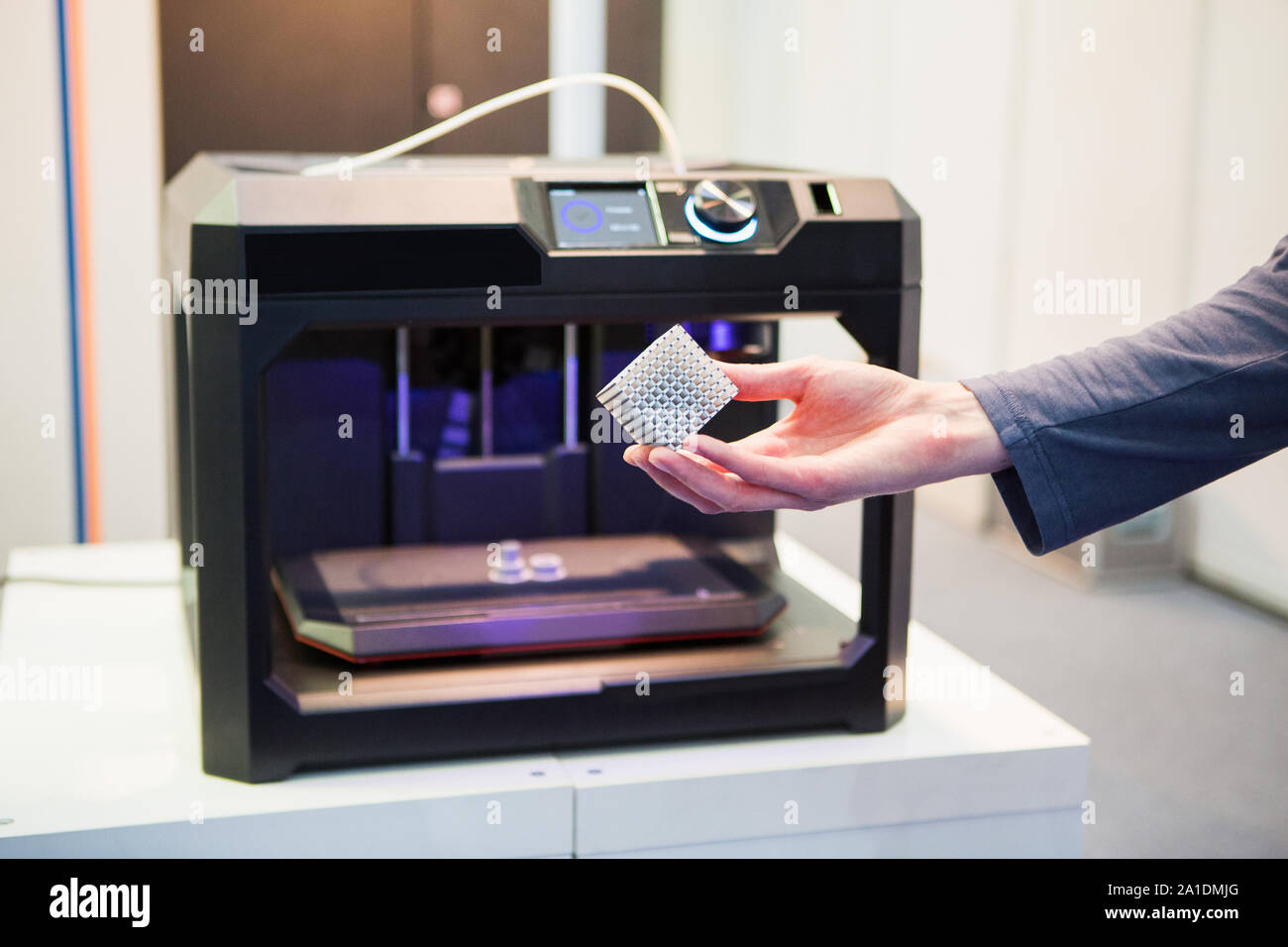 A desktop 3d printer in the laboratory for prints a structure from a ...