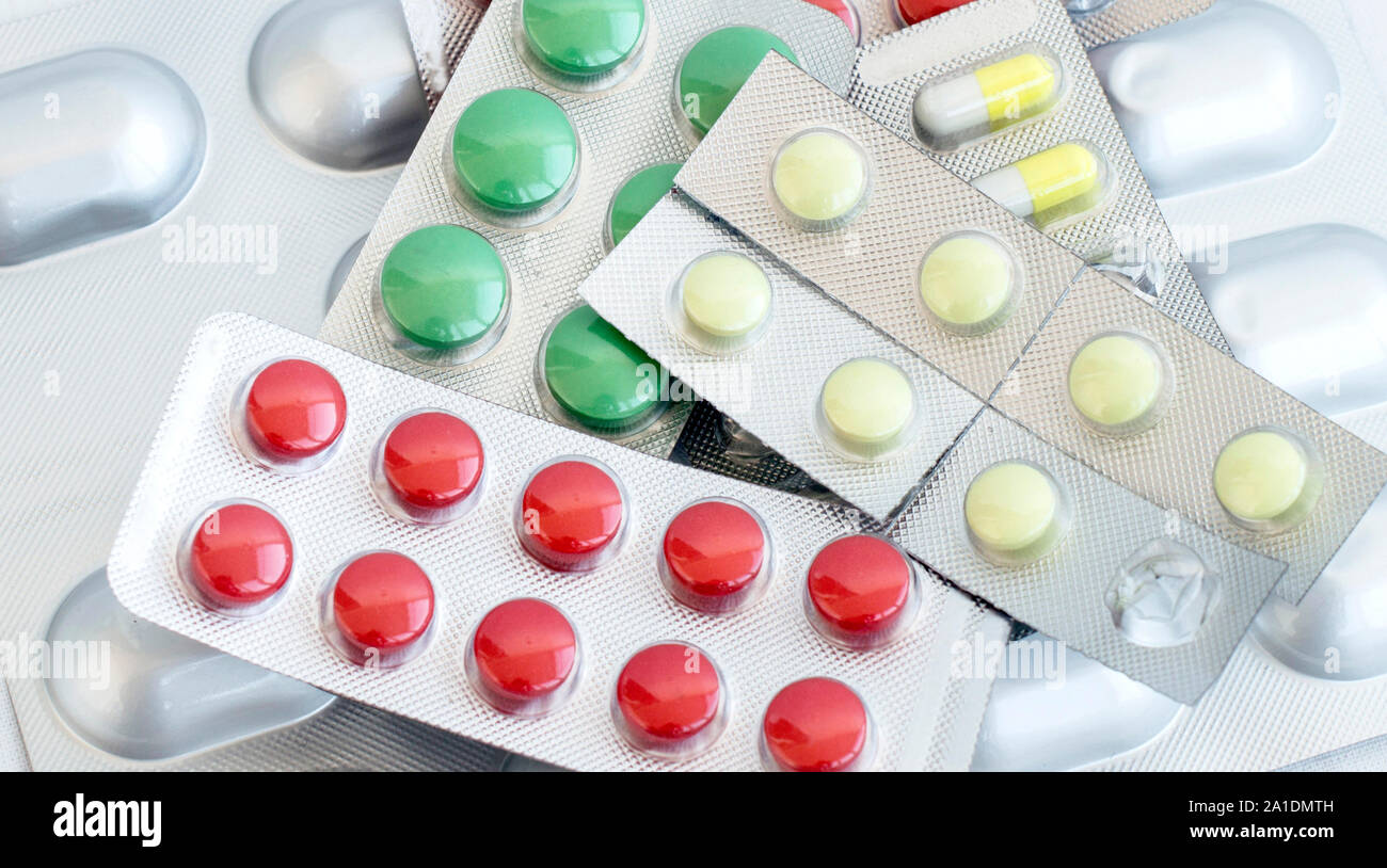 A variety of different colored pills for the treatment and prevention ...