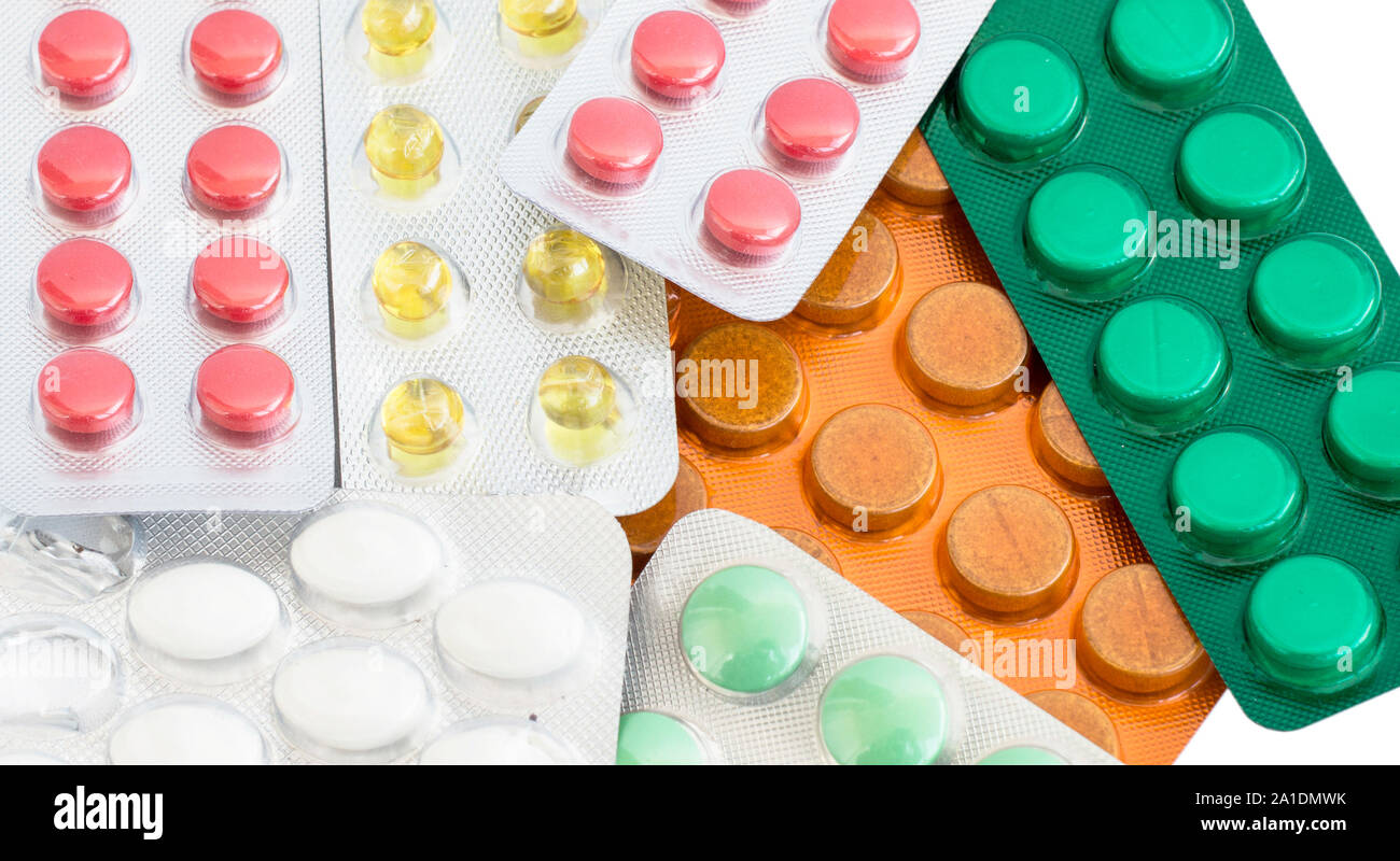 Different tablets of different colors on a white background Stock Photo ...
