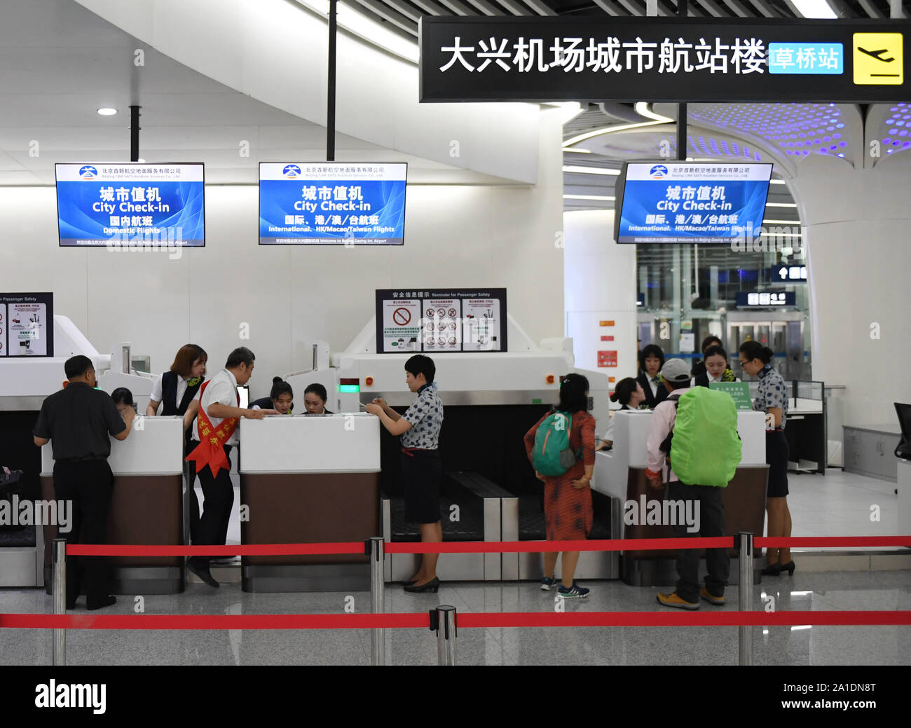 Beijing, China. 26th Sep, 2019. Passengers check in at City Terminal at ...