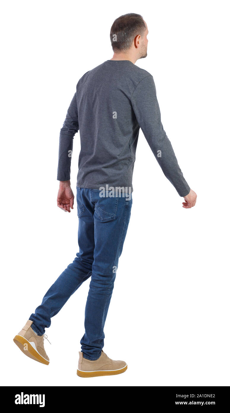 Side view of going handsome man. walking young guy . Rear view people ...