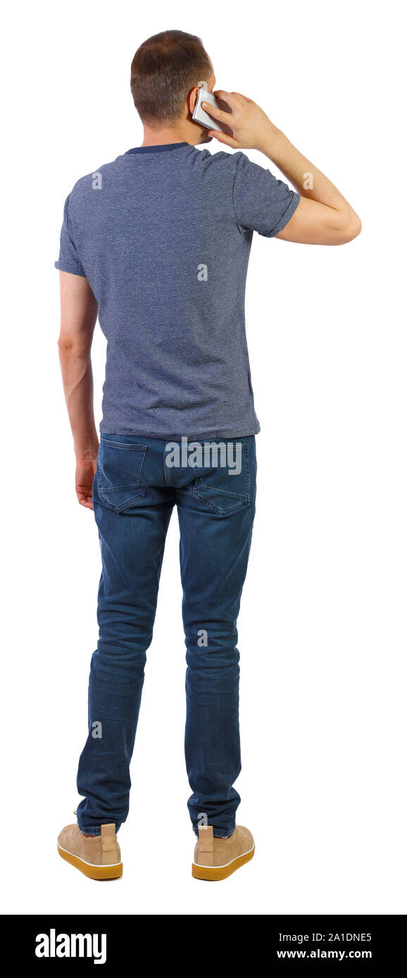 back view of a man talking on the phone. backside view of person. Rear ...