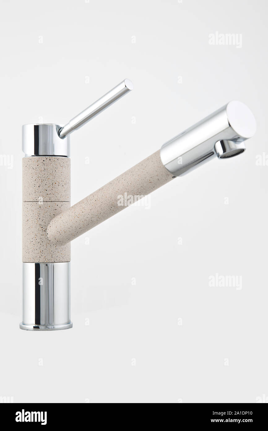 Modern textured faucet, for the kitchen sink. Isolated on white ...