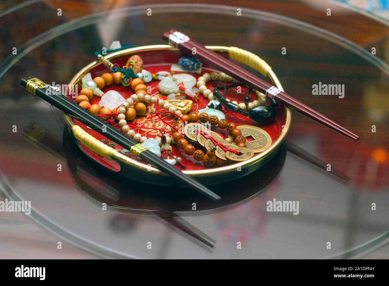 Traditional Chinese objects, bracelets, coins, toothpicks Stock Photo ...