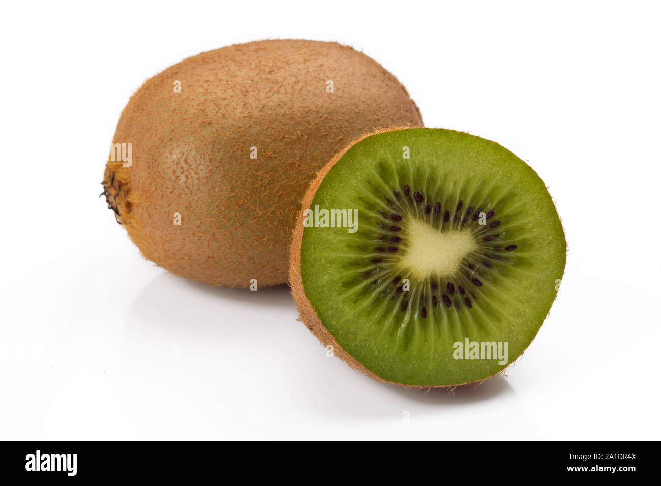 closeup of two kiwis one full and the other cut, isolated on white ...