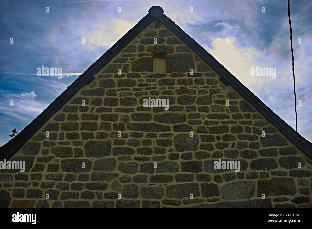 Back view on small old stone farm house Stock Photo - Alamy