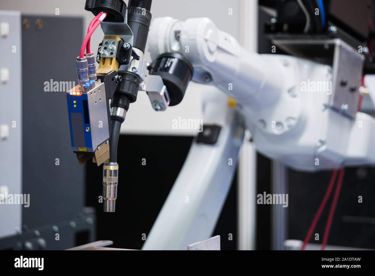 Automatic welding robot in a modern factory in operation Stock Photo ...