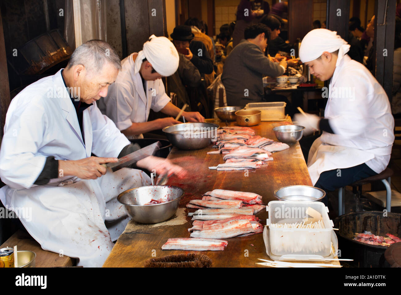 Japanese people kill and fillet eel fish for show and cooking kabayaki ...