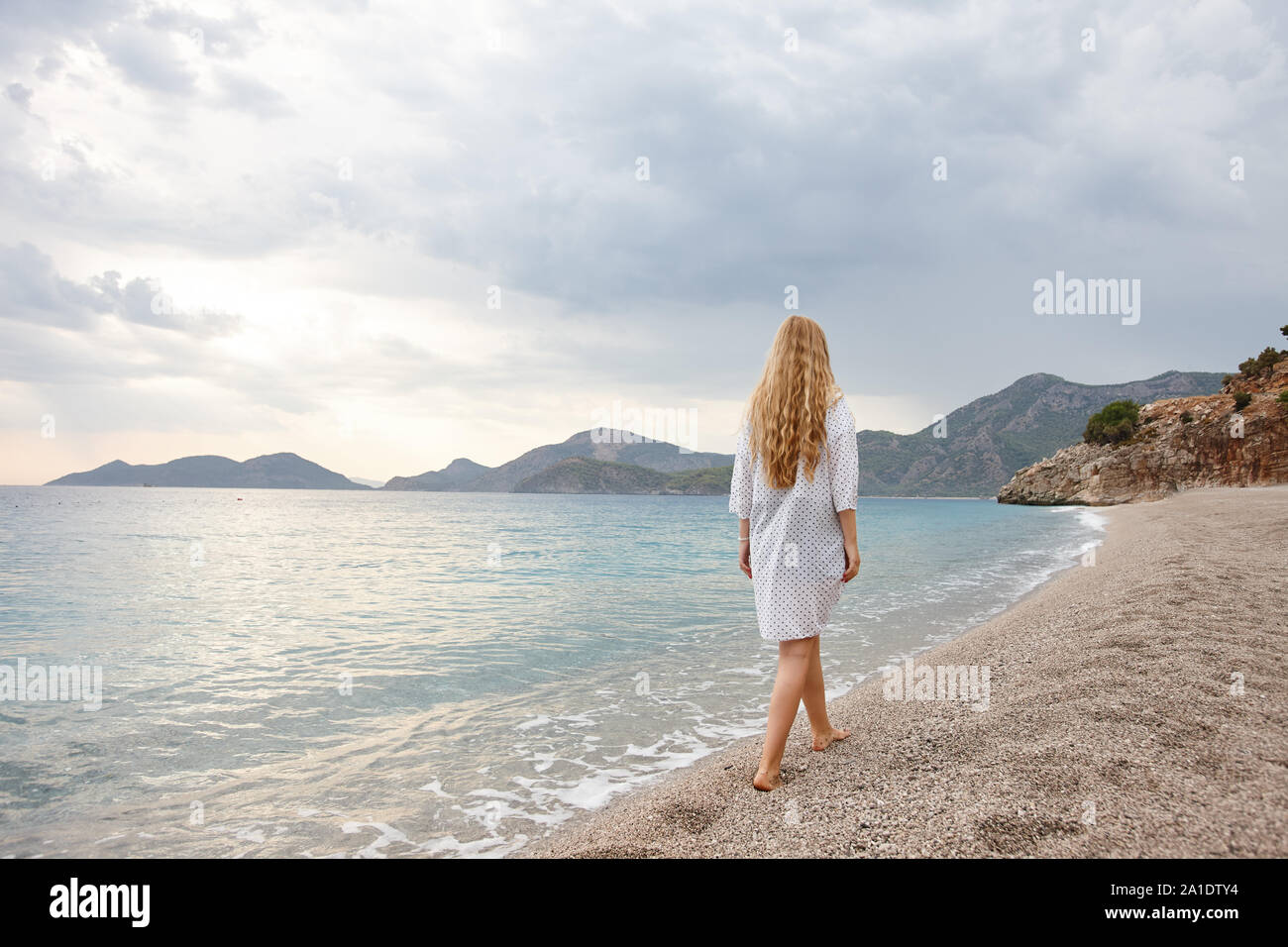 Young woman on deserted hi-res stock photography and images - Alamy