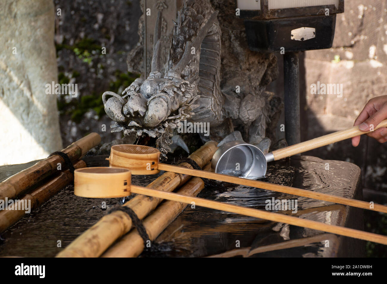 Chozusha or Holy water in wash hand stone basin for people washing ...