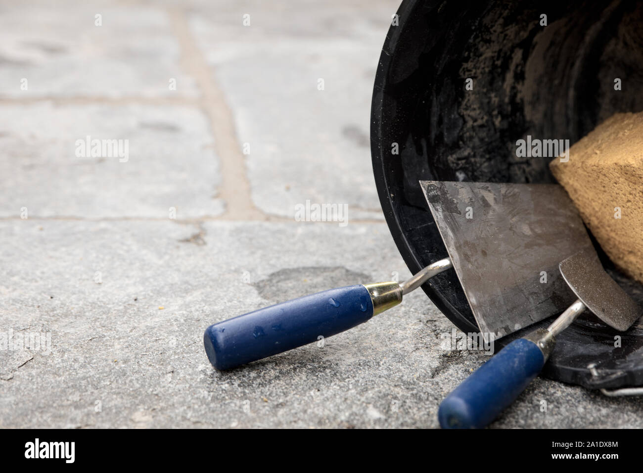 tools of a stone mason on a stone outdoor floor Stock Photo - Alamy