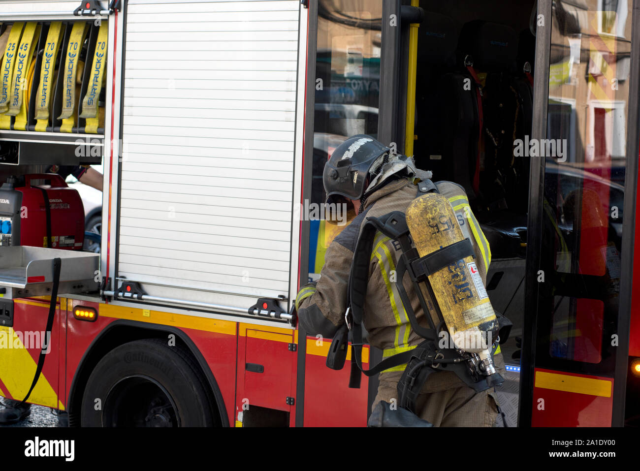 Spanish firefighters respond to an apartment fire in the Macarena ...