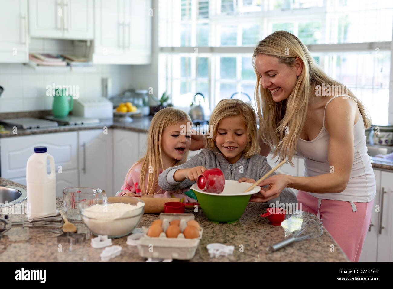 Family making Christmas cookies at home Stock Photo - Alamy