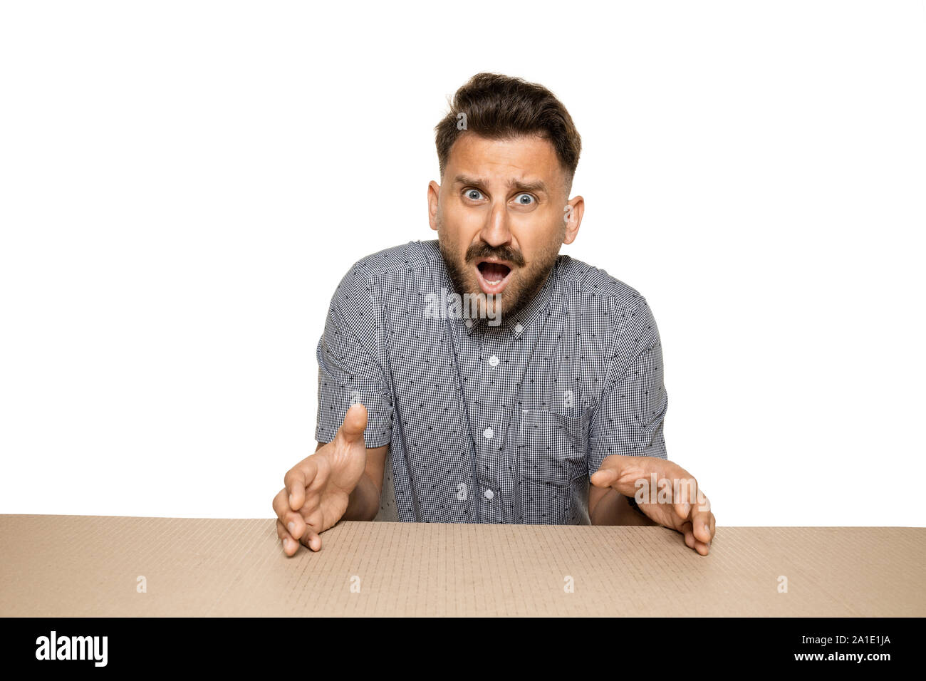 Man opening box disappointed hi-res stock photography and images - Alamy